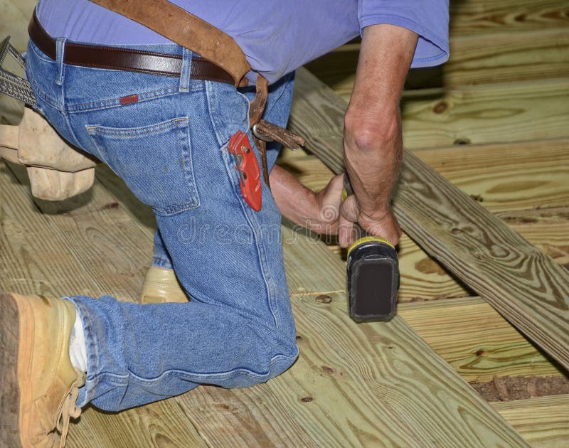 Construction Worker Building a Wood Deck Stock Image - Image of ...