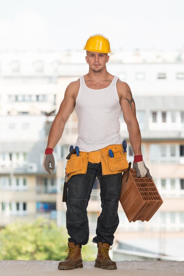 Construction Worker Carrying Brick Stock Photo - Image of occupation ...
