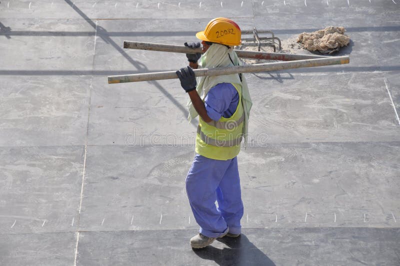 115 Worker Carrying Pipes Stock Photos - Free & Royalty-Free Stock ...