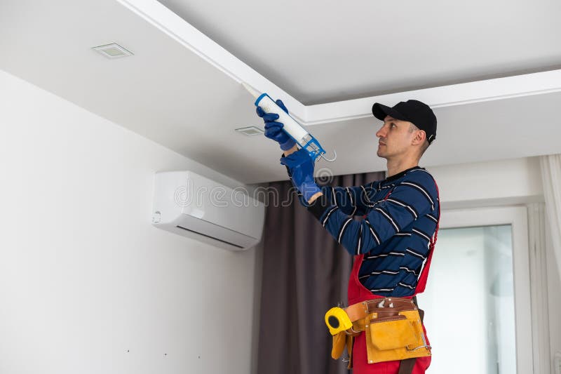 Construction Worker Ceiling Work. Working on Repairs Stock Image ...
