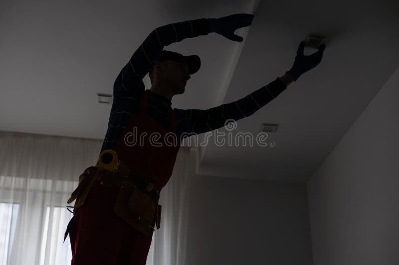 Construction Worker Ceiling Work. Working on Repairs Stock Photo ...