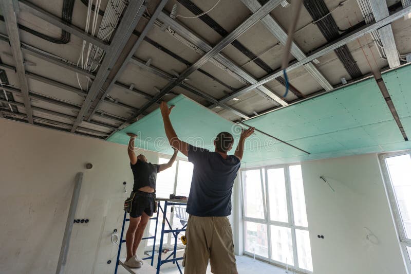 Construction Worker Ceiling Work Installation Stock Photo - Image of ...