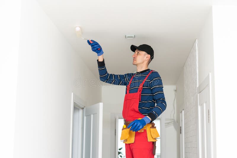 Construction Worker Ceiling Work. Working on Repairs Stock Image ...