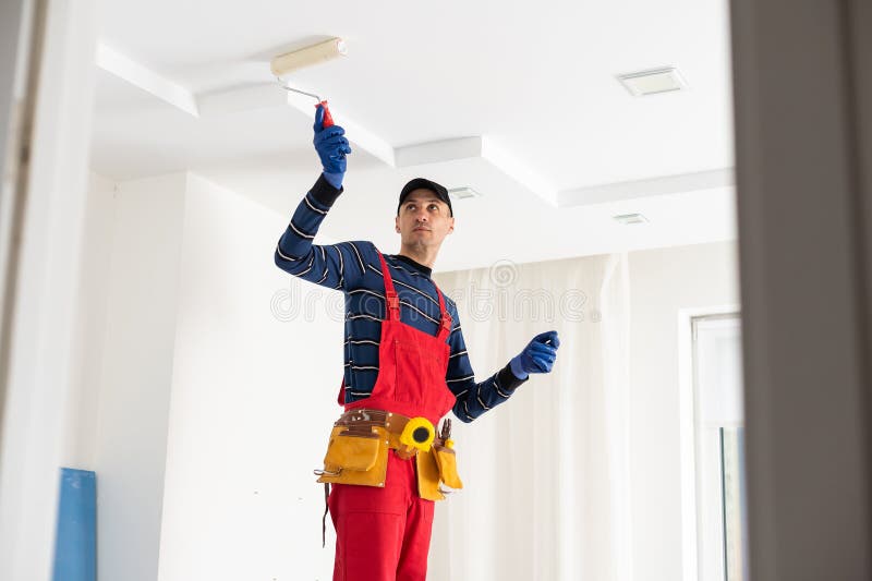 Construction Worker Ceiling Work. Working on Repairs Stock Image ...