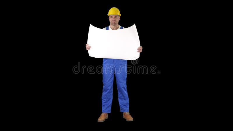 Construction Worker Checking Blueprints on Site, Alpha Channel Stock ...
