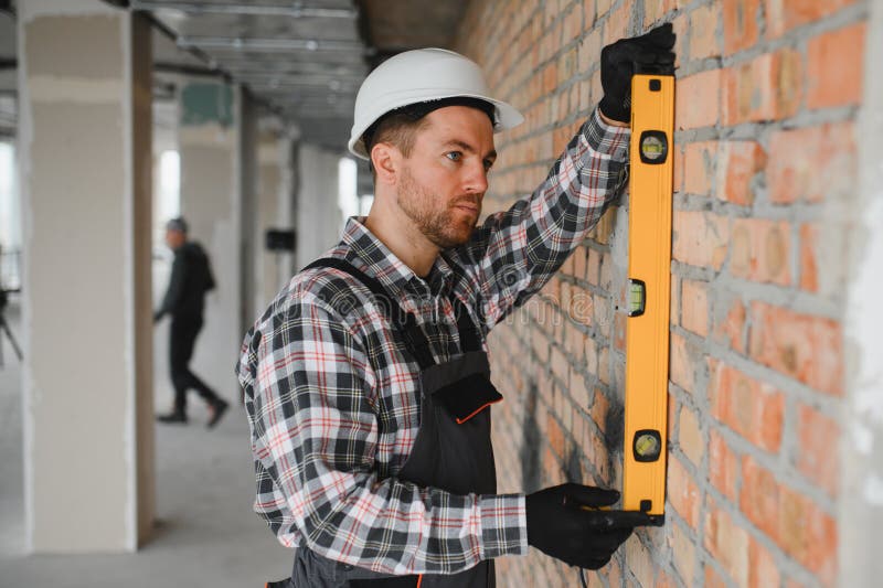 508 Construction Worker Check Level Wall Stock Photos - Free & Royalty ...