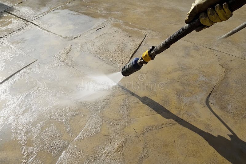 Construction Worker Cleaning Concrete Surface with High Pressure Water ...