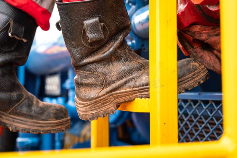 A Construction Worker is Climbing on the Platform Ladder. Stock Photo ...