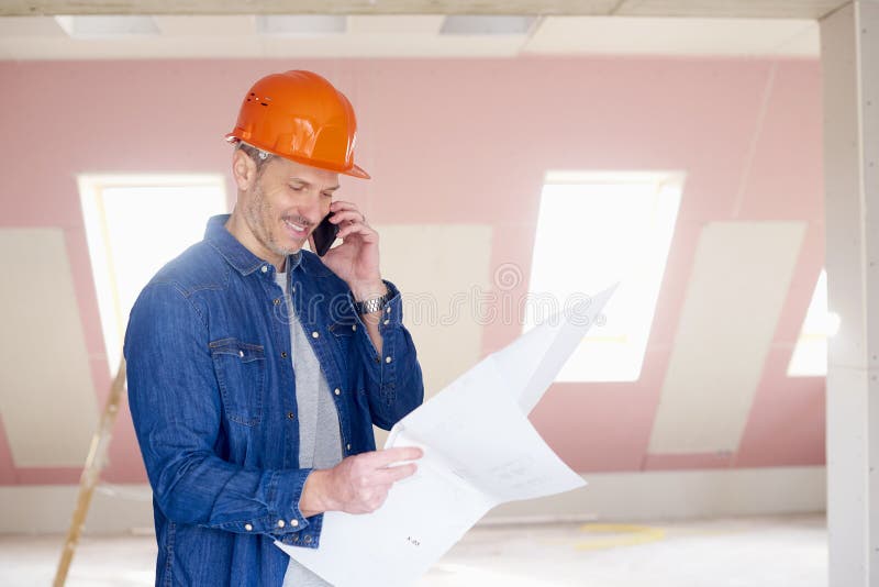 Construction Worker Consulting with Somebody Stock Photo - Image of ...