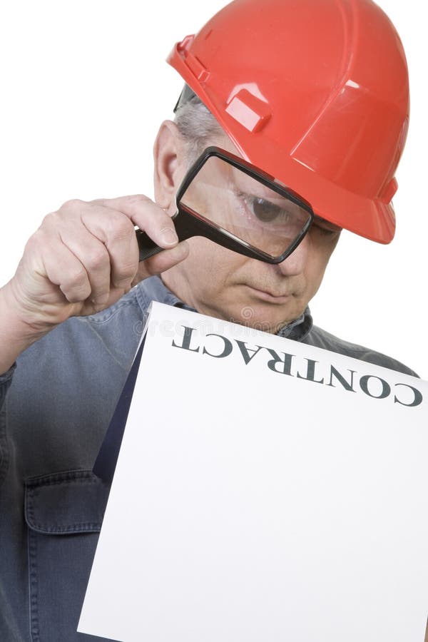 Construction Worker with Contract Stock Image - Image of scrutinizing ...