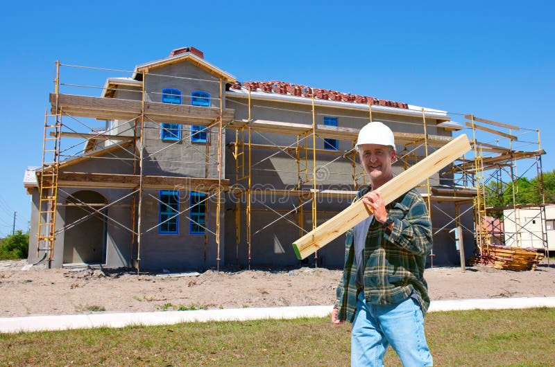 House Construction with a Contractor at Work Stock Photo - Image of ...
