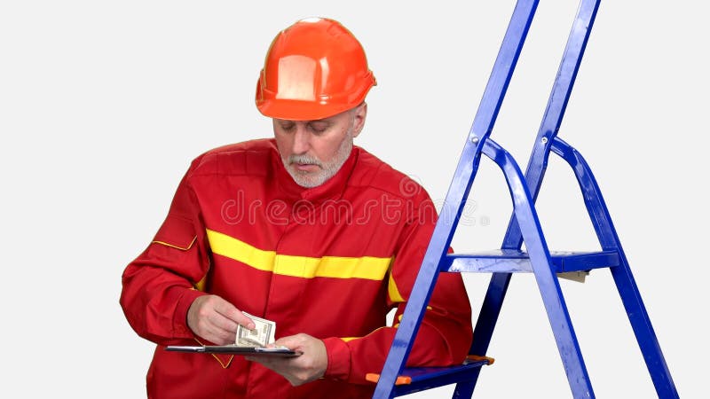 Portrait of Construction Worker is Counting Money. Stock Video - Video ...