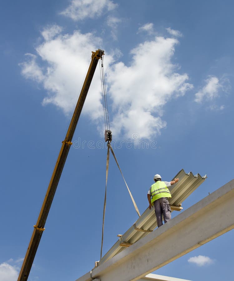 Construction Worker with Crane Editorial Stock Photo - Image of blue ...
