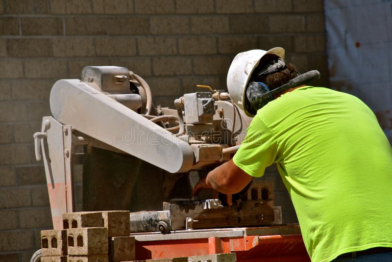 Construction Worker Cutting Bricks on Saw Editorial Stock Photo - Image ...