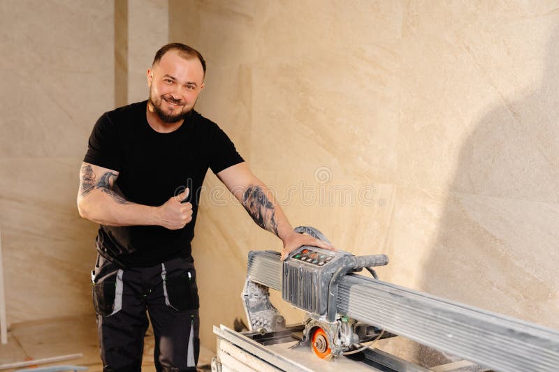 Construction Worker Cutting Ceramic Tiles Using Professional Machine ...