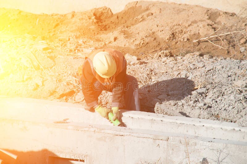 Construction Worker Cutting Stock Photo - Image of grinder, light: 72231532