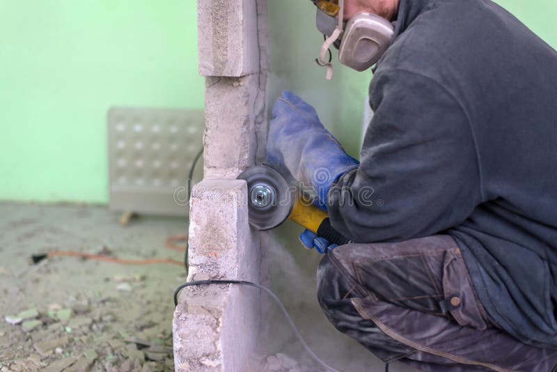 Construction Worker Cutting Concrete Wall by Using Electric Cutter ...