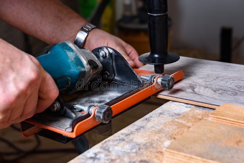 Construction Worker Cutting Laminate Using Angle Grinder with Stand for ...