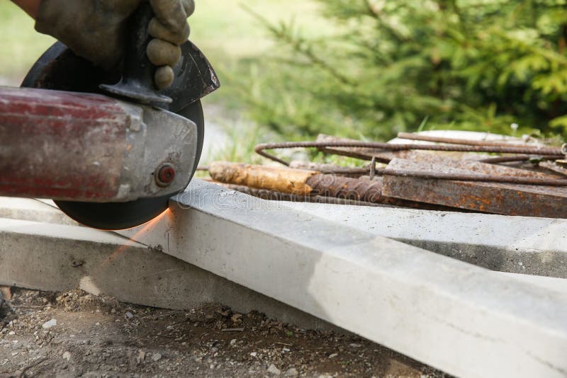 Construction Worker Cutting a Reinforced Concrete Pillar Stock Image ...