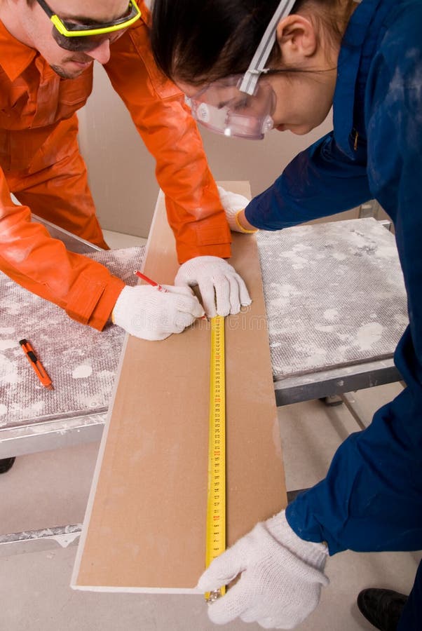 Construction Worker Doing Measuring Stock Photo - Image of master ...