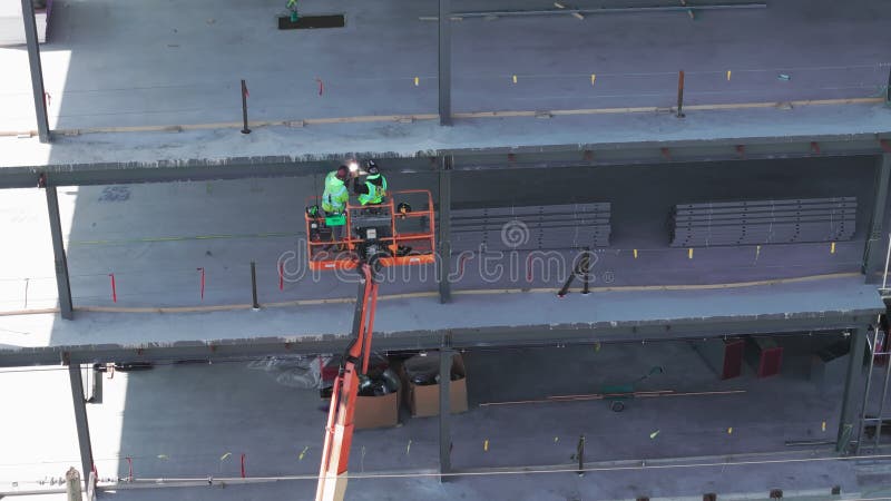 Construction Worker Doing Welding Work. Aerial View Stock Video - Video ...