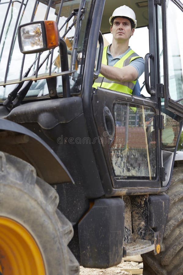 Construction Worker Driving Digger Stock Photo - Image of outdoors ...