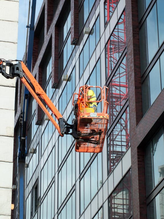 Construction Worker on an Elevated Platform Editorial Image - Image of ...