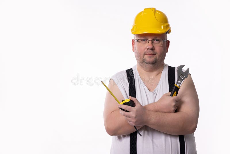 A Construction Worker Equipped with Various Tools while Wearing ...