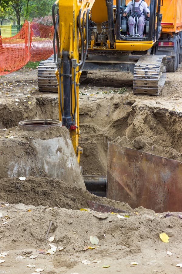 Construction Worker in Excavator Stock Photo - Image of excavation ...