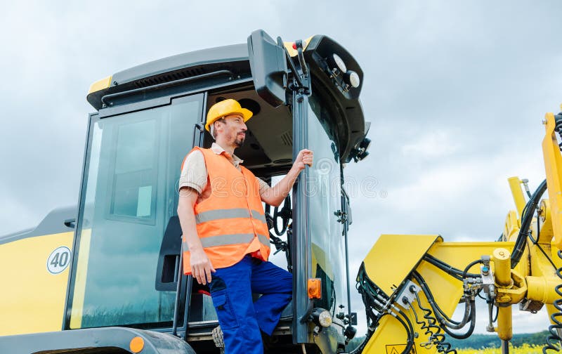 Construction Worker on Excavator Planning the Work To Be Done Stock ...