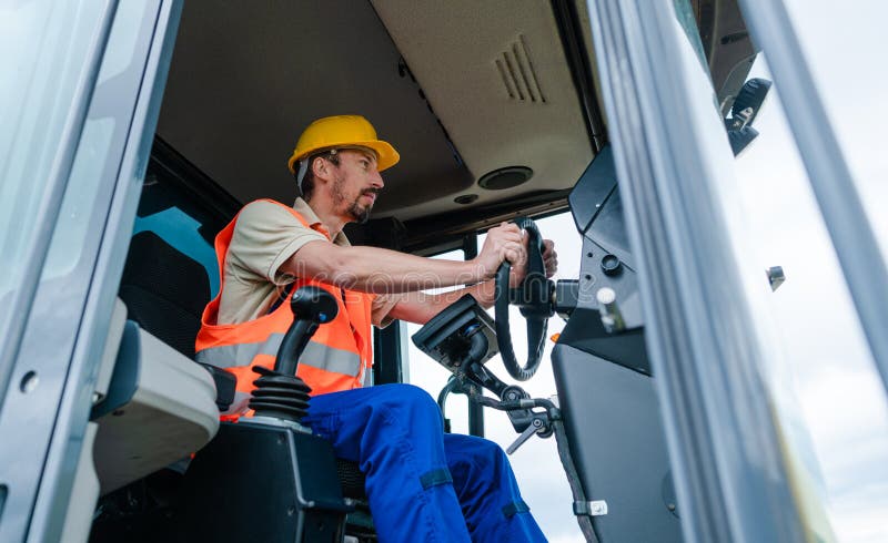 Construction Worker on Excavator Planning the Work To Be Done Stock ...
