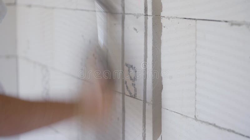 Construction Worker Expanding Electric Cable Chase Grooves with Wall ...