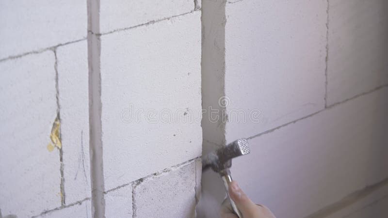 Construction Worker Expanding Electric Cable Chase Grooves with Wall ...