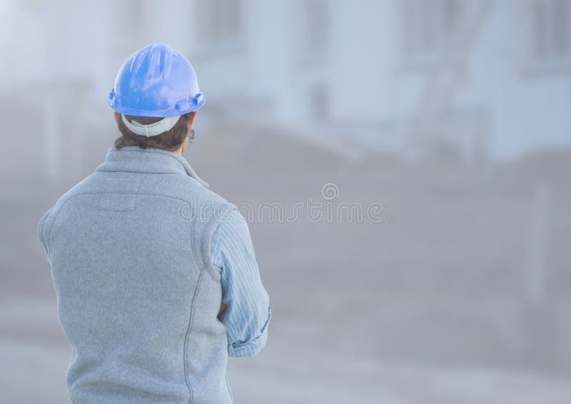 Construction Worker Facing Back in Front of Construction Site Stock ...
