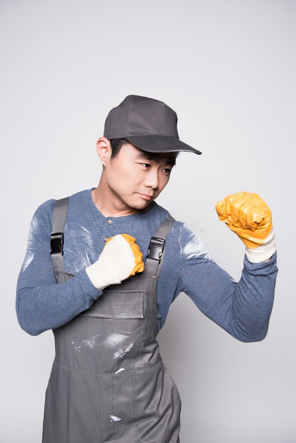 Construction Worker in Fighting Pose Stock Image - Image of ...