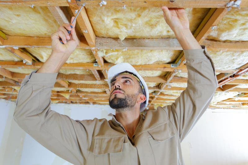 Construction Worker Fixing Ceiling Stock Image - Image of mobile ...