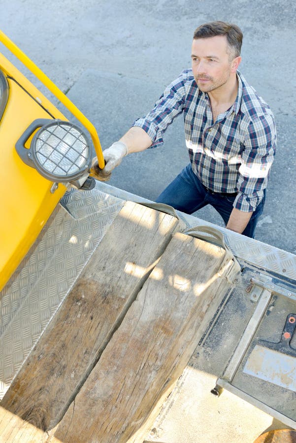 Construction Worker in Front Pile Driver Machine Stock Photo - Image of ...