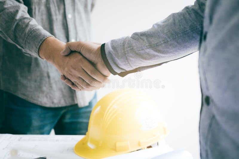 Construction Worker Greeting a Foreman at Renovating Apartment. Stock ...