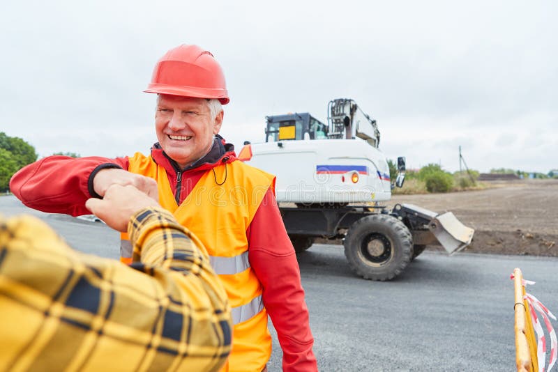 Construction Worker Greets Colleagues with a Fist Bump Stock Image ...