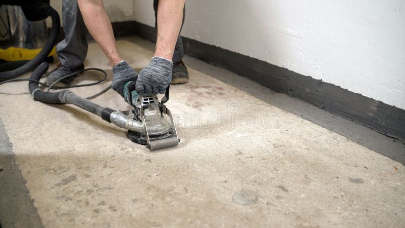 Construction Worker Grinding Concrete Floor Stock Image - Image of ...