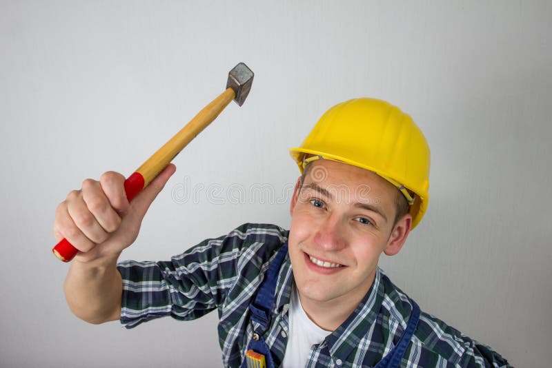 Construction Worker with a Hammer Stock Image - Image of machines ...