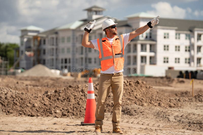 Construction Worker with Hardhat Helmet on Construction Site ...