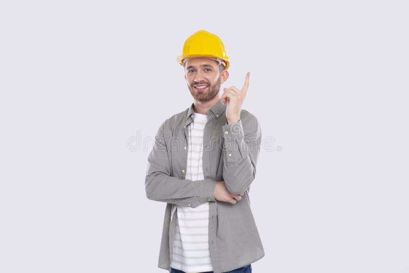 Construction Worker Having a Great Idea. Man with Idea Holding Finger ...
