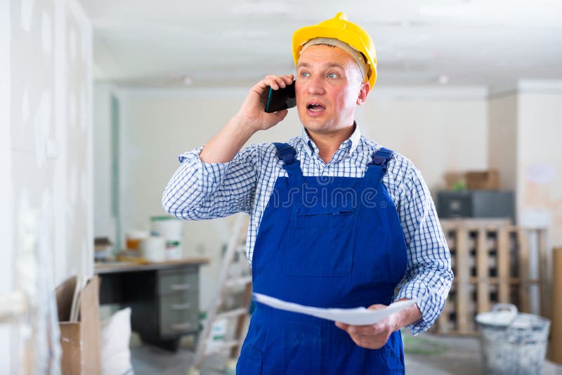 Construction Worker Having Telephone Conversation Stock Image - Image ...