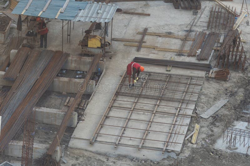 Construction Worker in High Visibility Clothing Operating Tower Crane ...