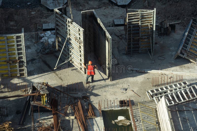 Construction Worker in High Visibility Clothing Operating Tower Crane ...
