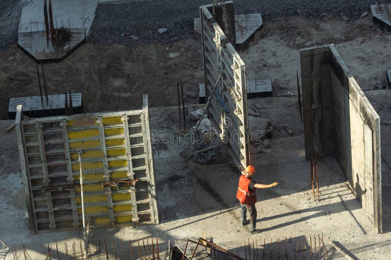 Construction Worker in High Visibility Clothing Operating Tower Crane ...