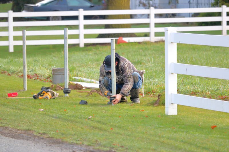 Professional Worker Constructs Fence Stock Photo - Image of industrial ...
