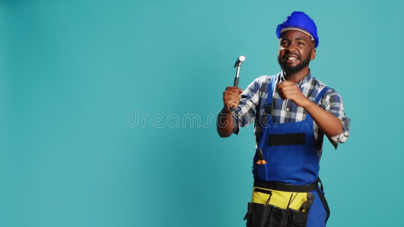 Construction Worker Hitting Something with Hammer Stock Footage - Video ...