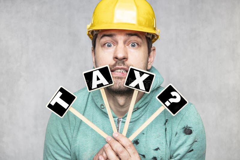 Construction Worker Holding a Blackboard with Space for Text or Text ...